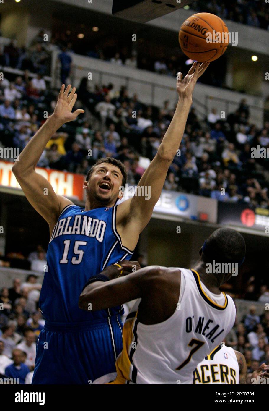 Orlando Magic's Hedo Turkoglu, left, of Turkey, shoots over Indiana ...