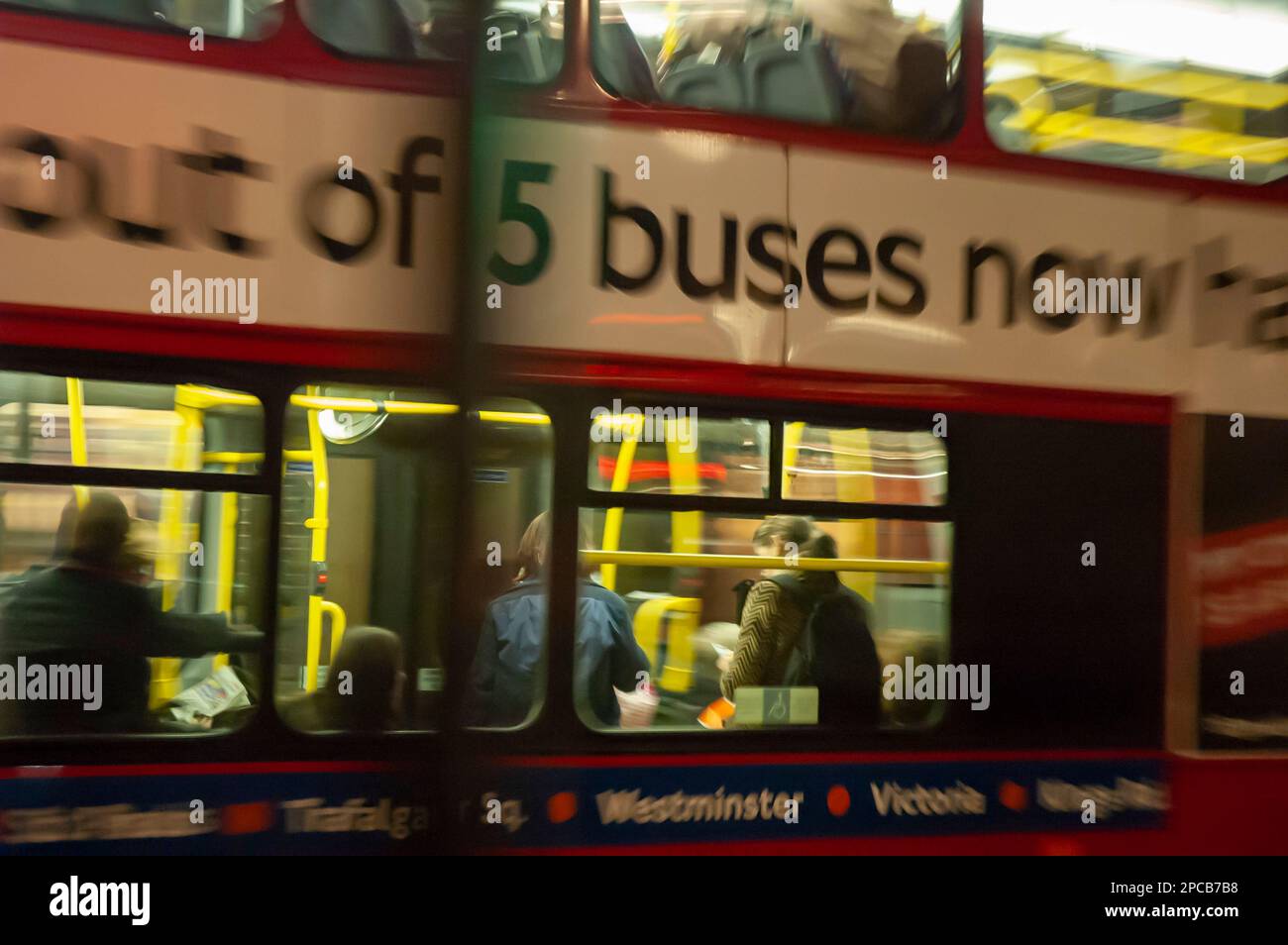 London double decker bus in motion at night Stock Photo - Alamy