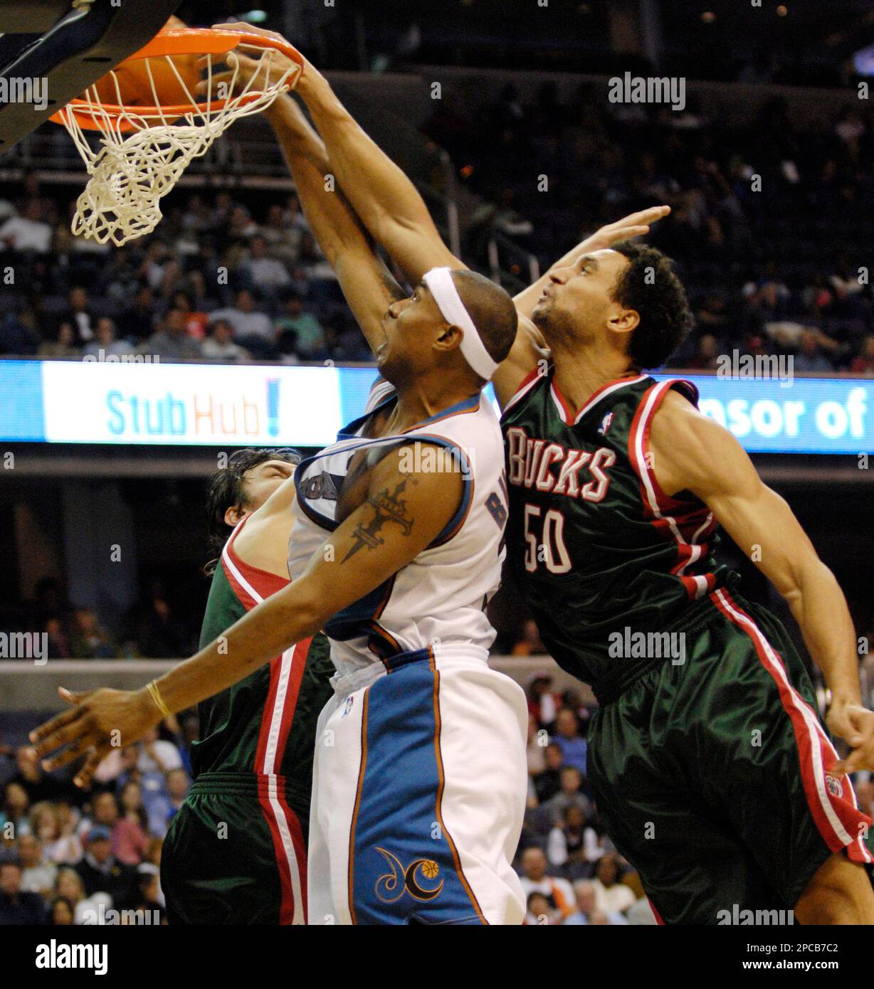 Milwaukee Bucks' Dan Gadzuric (50), of the Netherlands, blocks a shot ...