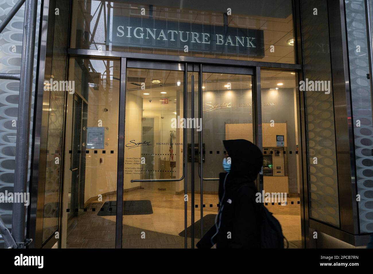 New York, USA. 13th Mar, 2023. A person walks by Signature Bank branch ...