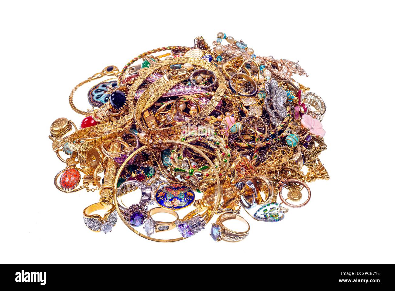 Horizontal shot of a pile of vintage gold jewelry isolated on white ...