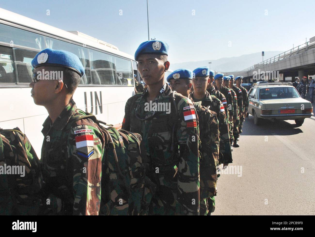 Indonesian U.N. peacekeepers line up as they wait to board a bus upon ...