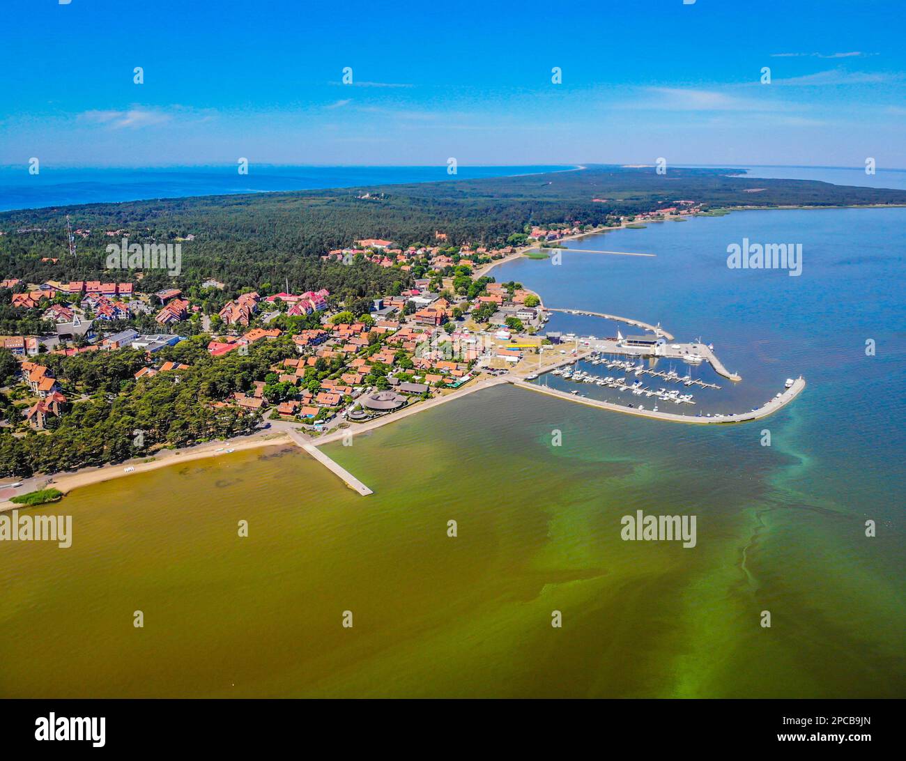 Aerial view of Nida - largest town of Curonian spit in Lithuania, next ...
