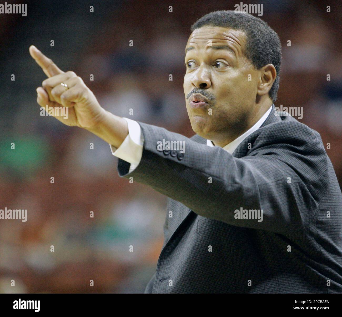 Alcorn State head basketball coach Samuel West motions a signal to the ...