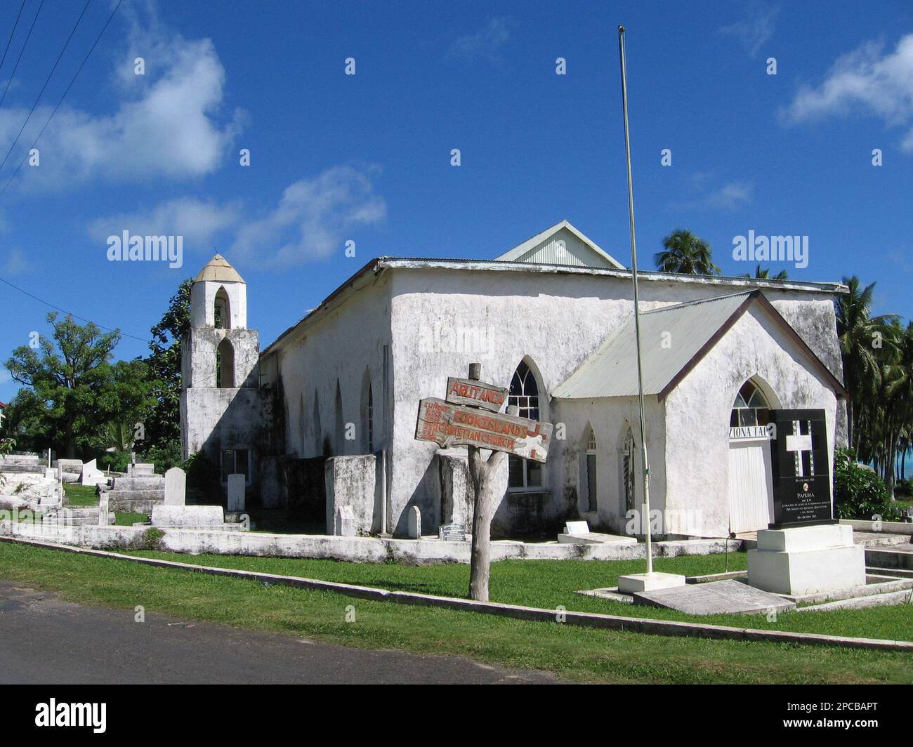 A Christian church and cemetery are seen on Aitutaki, Cook Islands ...