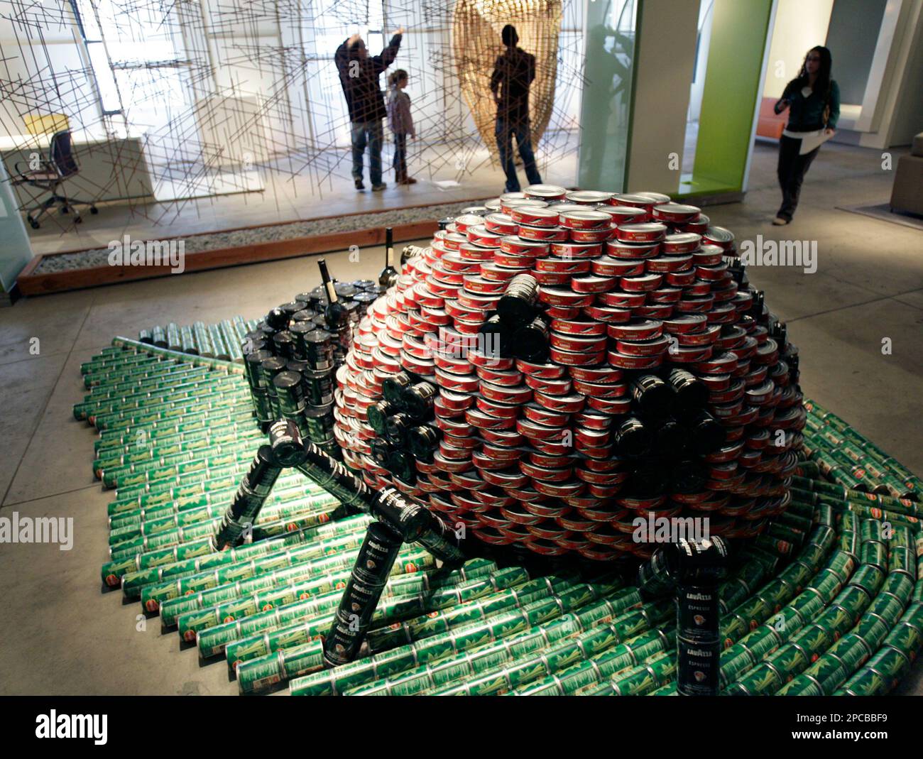 A ladybug on a leaf made of cans is seen as part of the 14th annual ...
