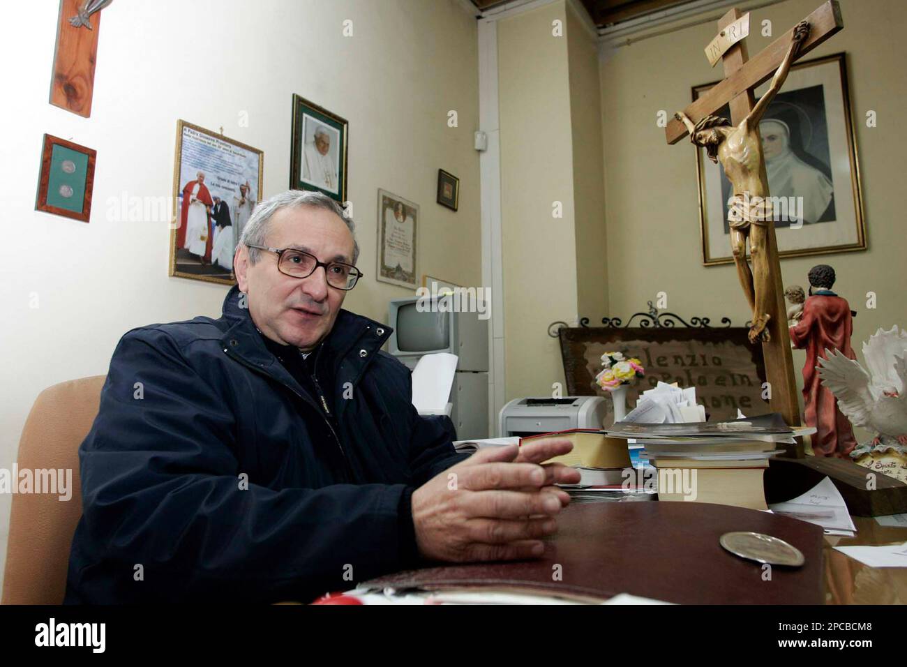 ** FILE ** Rev. Giuseppe Provitera speaks during an interview in his ...