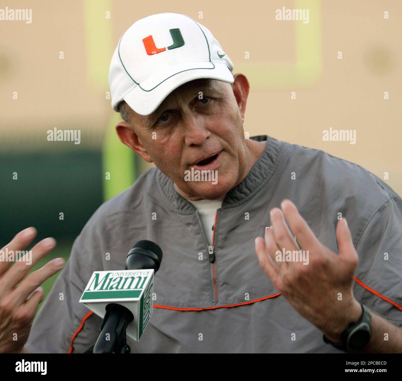 Miami head football coach Larry Coker talks to reporters in Coral ...