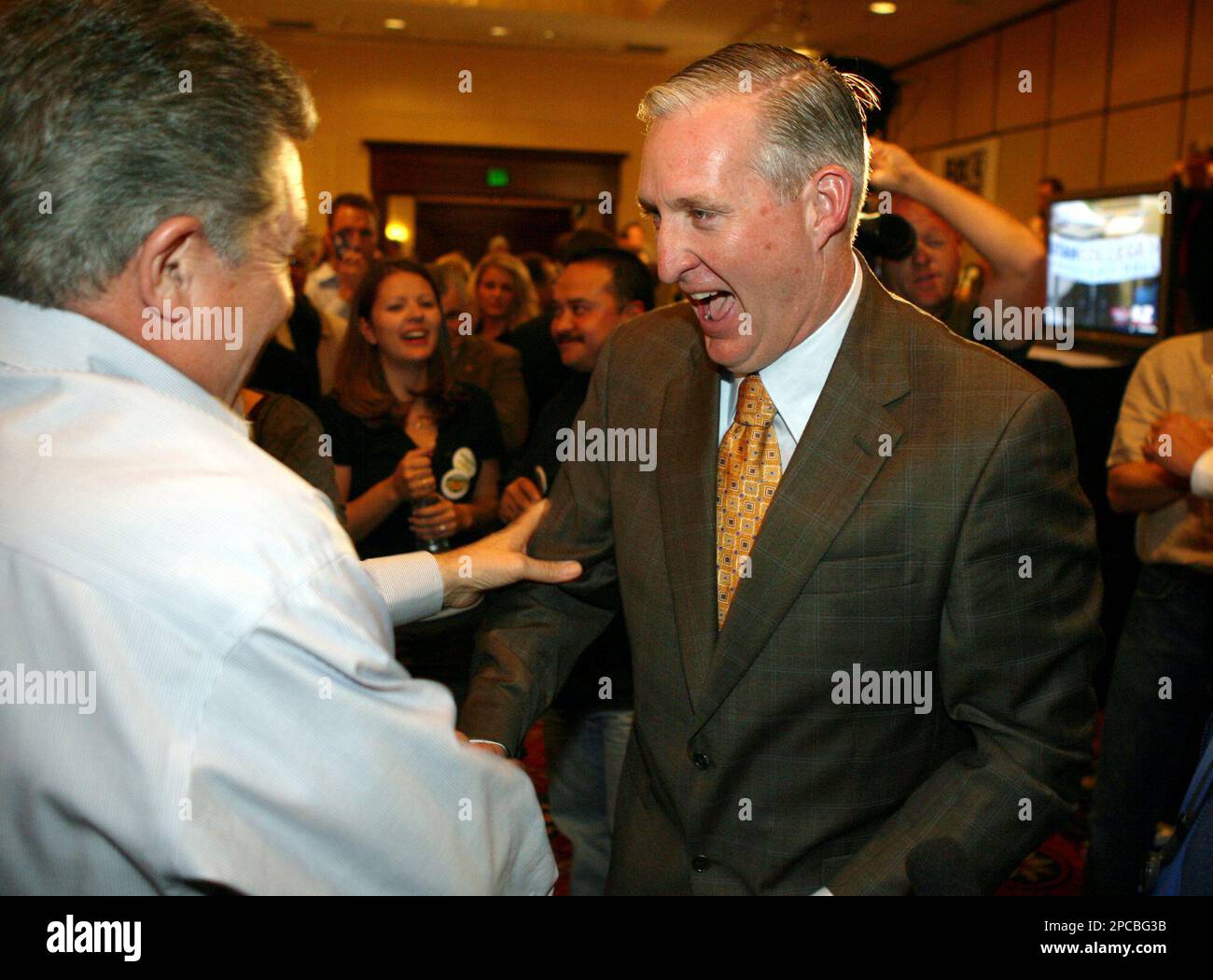 Salt Lake County Democratic Sheriff candidate Jim Winder, right is ...