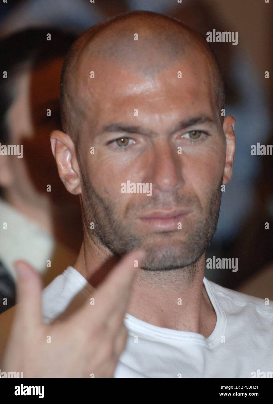 French footballer Zinedine Zidane looks on as he officially opens a ...