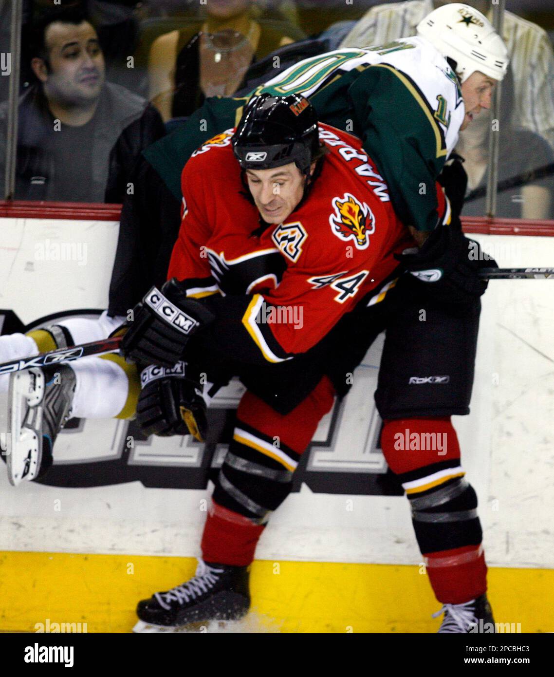 Dallas Stars' Brenden Morrow, right, gets up ended by Calgary Flames ...