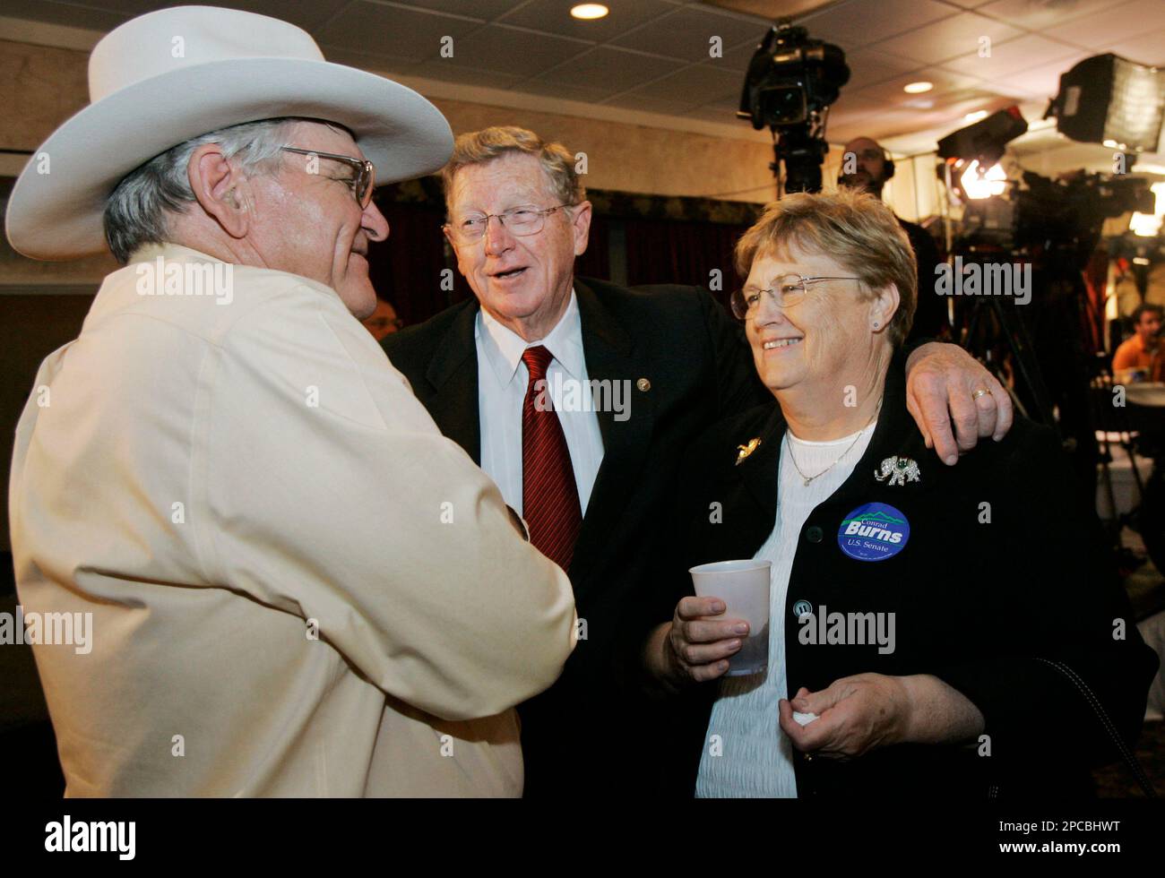 Sen. Conrad Burns, R-Mont., center, and his wife Phyllis talk with Mark ...