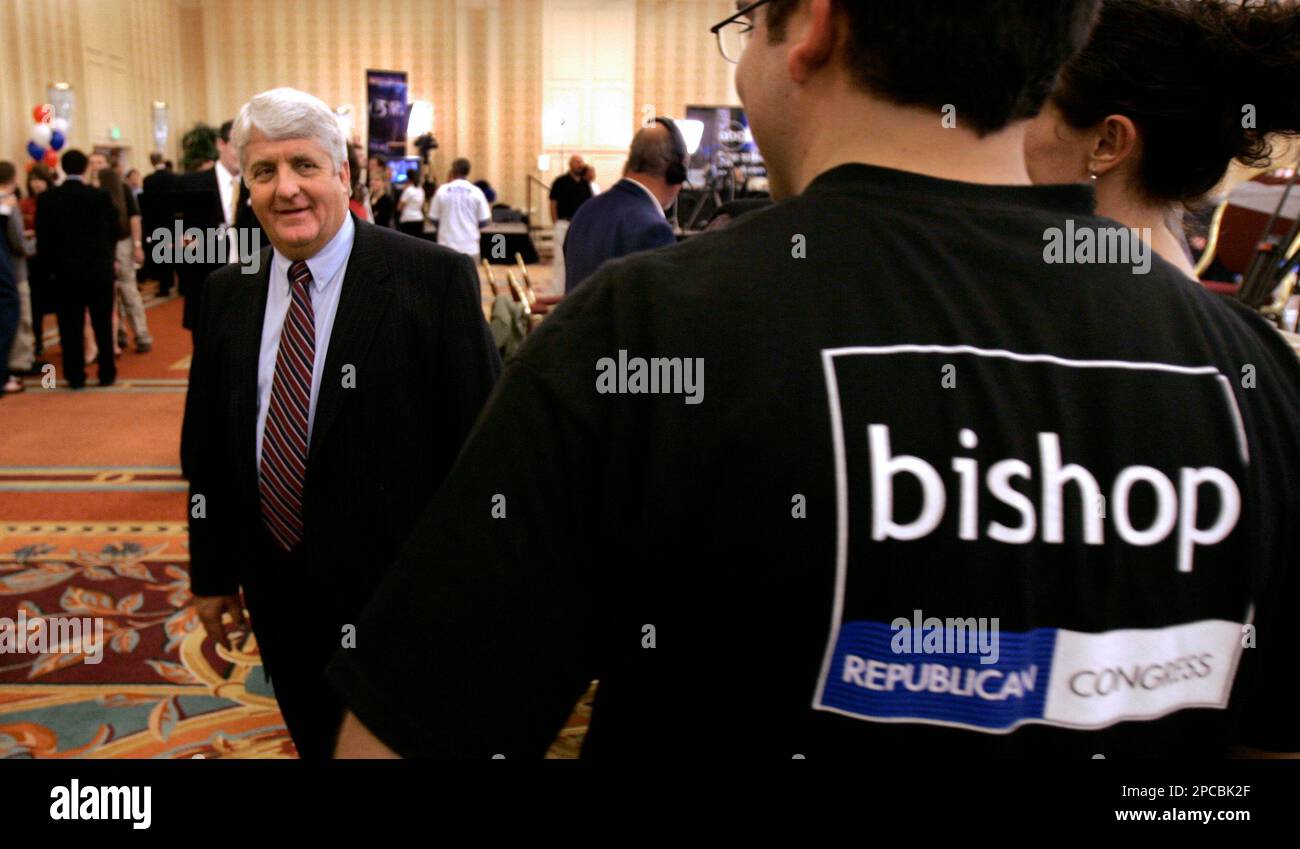 Rep. Rob Bishop, R-Utah, left, makes the rounds at the Republican ...