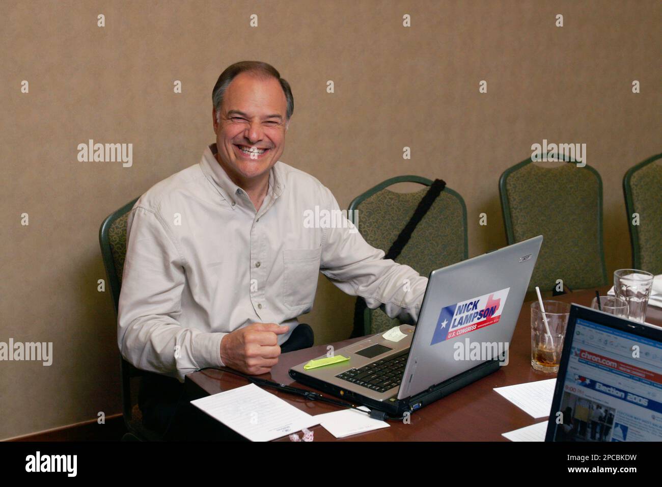 Democrat Nick Lampson, has a laugh while looking over early election ...