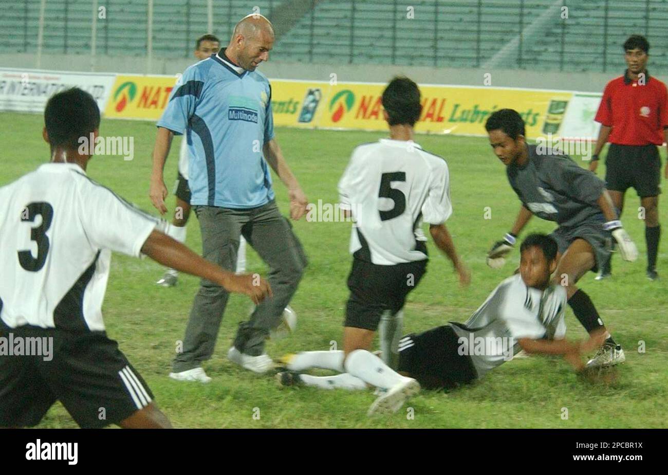 French Footballer Zinedine Zidane plays with Bangladeshi soccer players ...