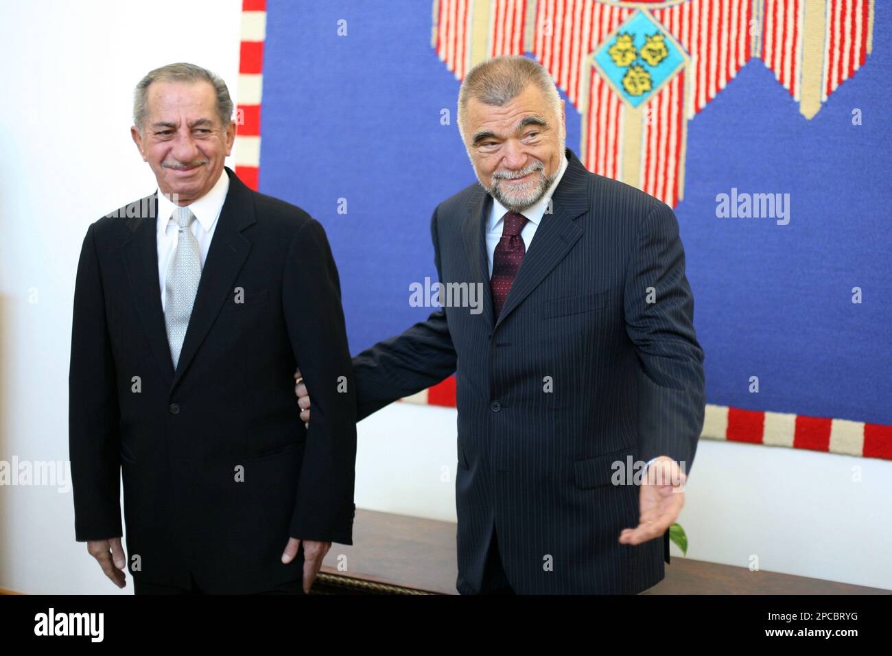 Tassos Papadopoulos, the president of the Republic of Cyprus, left, is ...