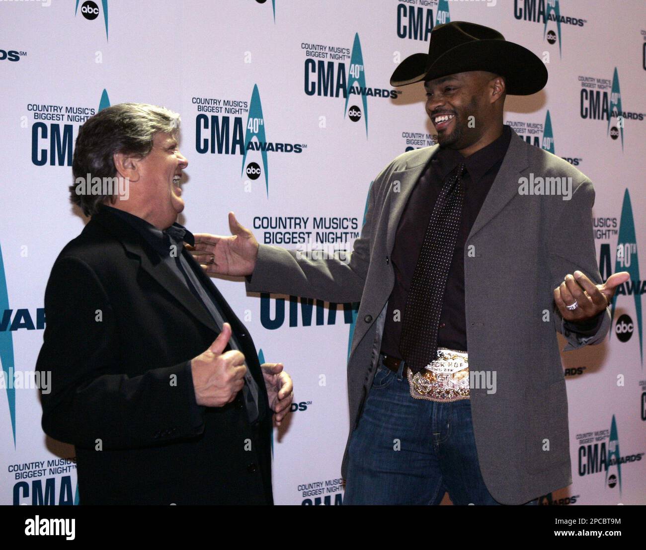 Phil Everly, left, and Cowboy Troy arrive at the 40th Annual CMA Awards ...