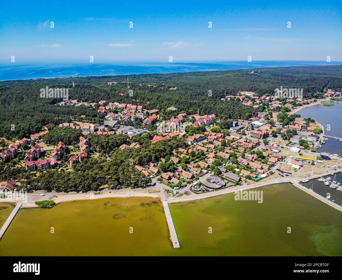 Aerial view of Nida - largest town of Curonian spit in Lithuania, next ...