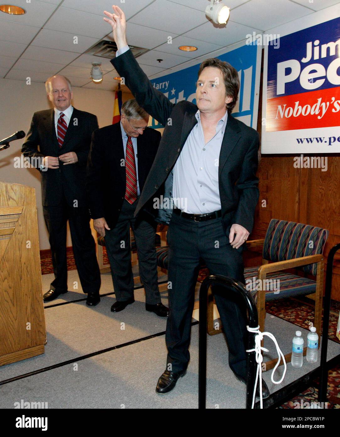 Actor Michael J. Fox waves to supporters at a rally for Democratic ...