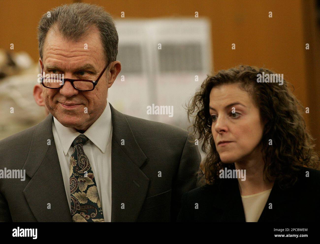 Michael Goodwin, left, stands with his attorney, Elena Saris, as his ...