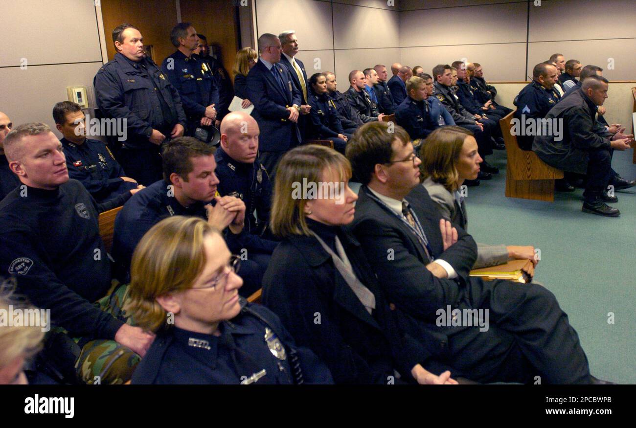 Manchester police officers fill the courtroom for the arraignment of ...