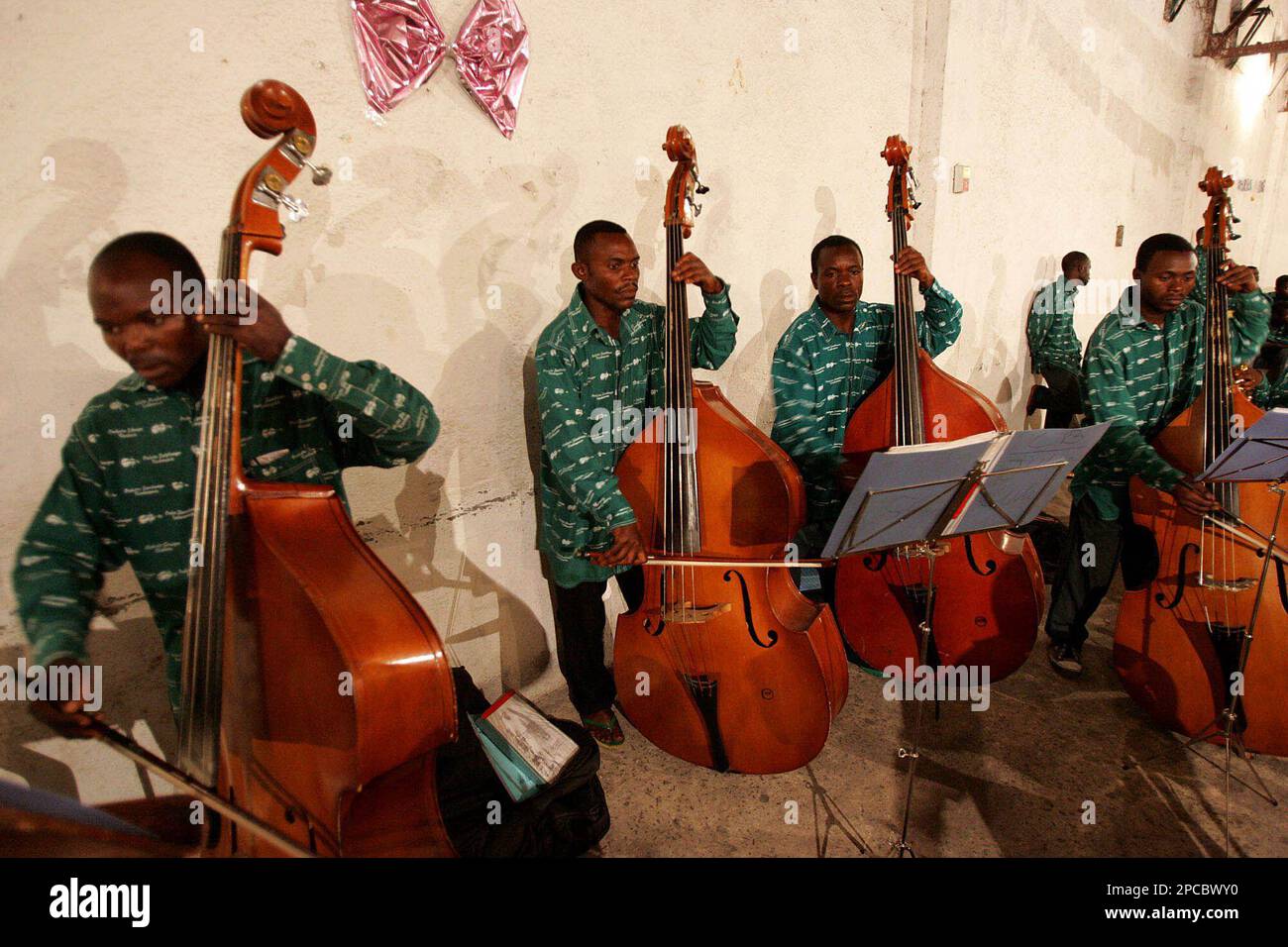 Members of the Kimbanguiste Symphony Orchestra play a piece by Mozart ...
