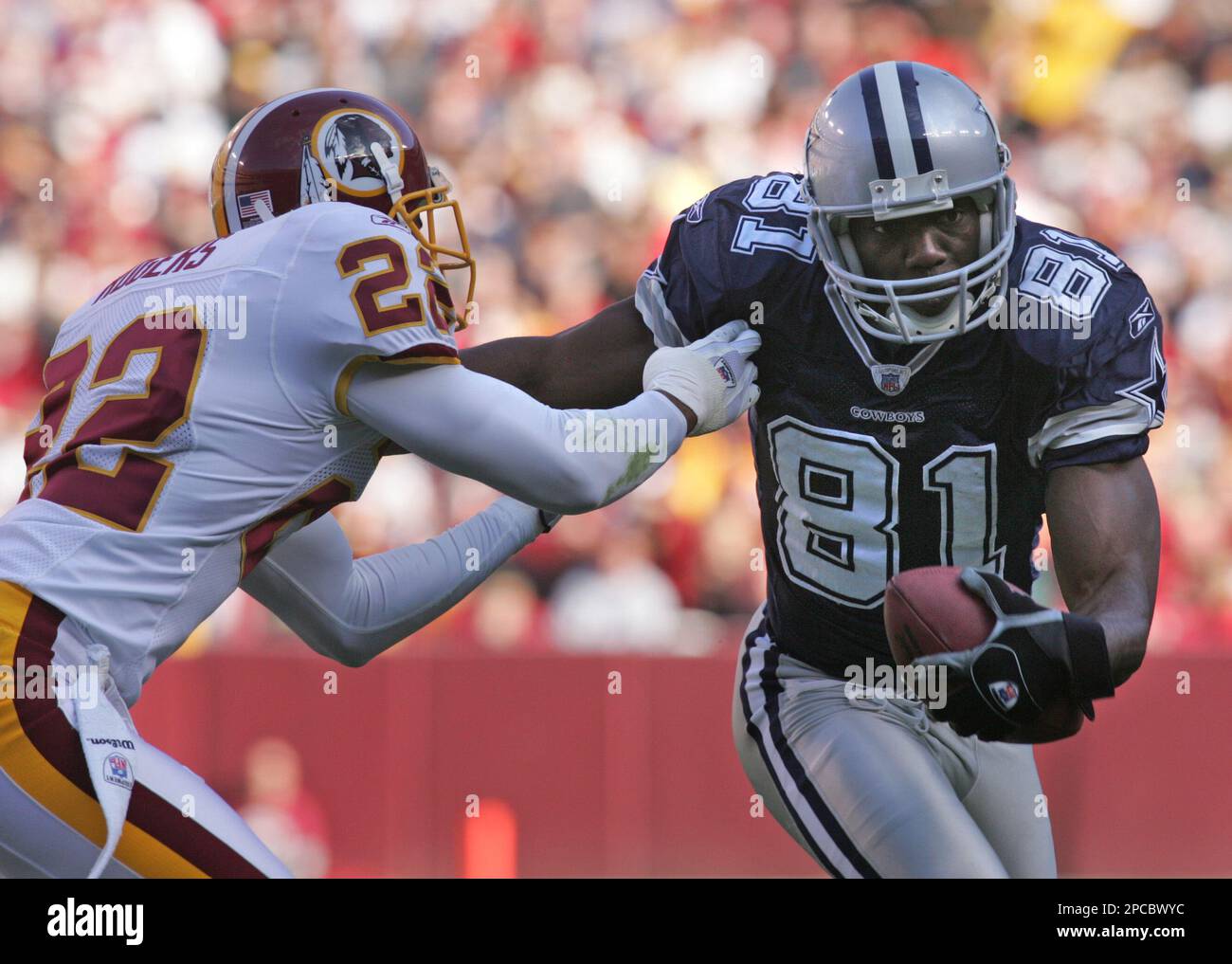 Washington Redskins Carlos Rogers (22) tries taking down Dallas Cowboys ...