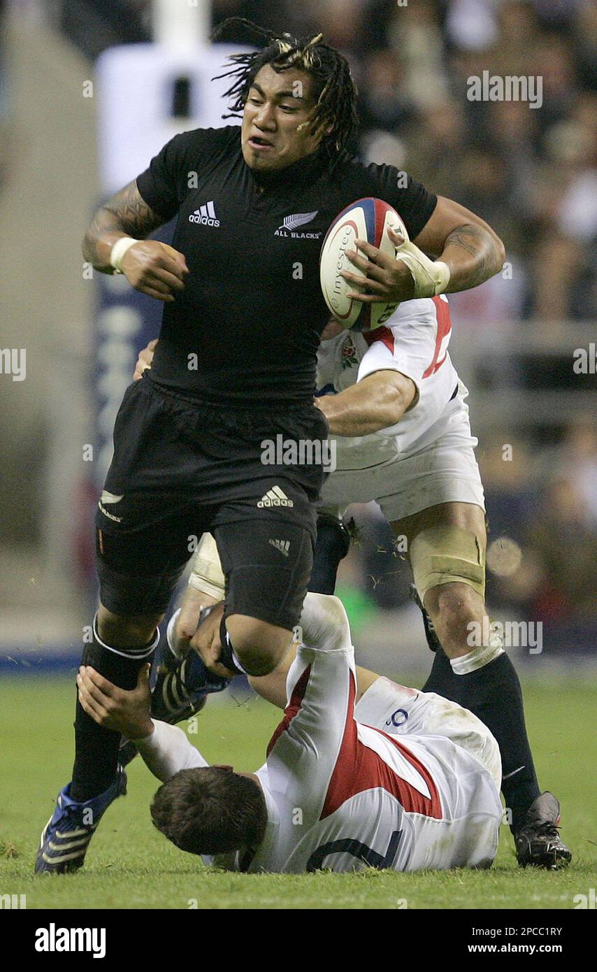 England's Jamie Noon tackles New Zealand's Ma'a Nonu during their rugby ...