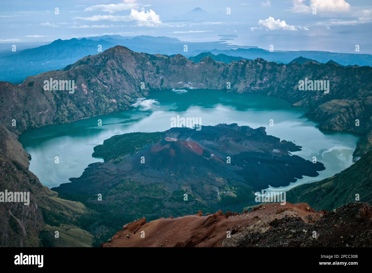 View of the caldera and its lake from the summit of Mount Rinjani ...