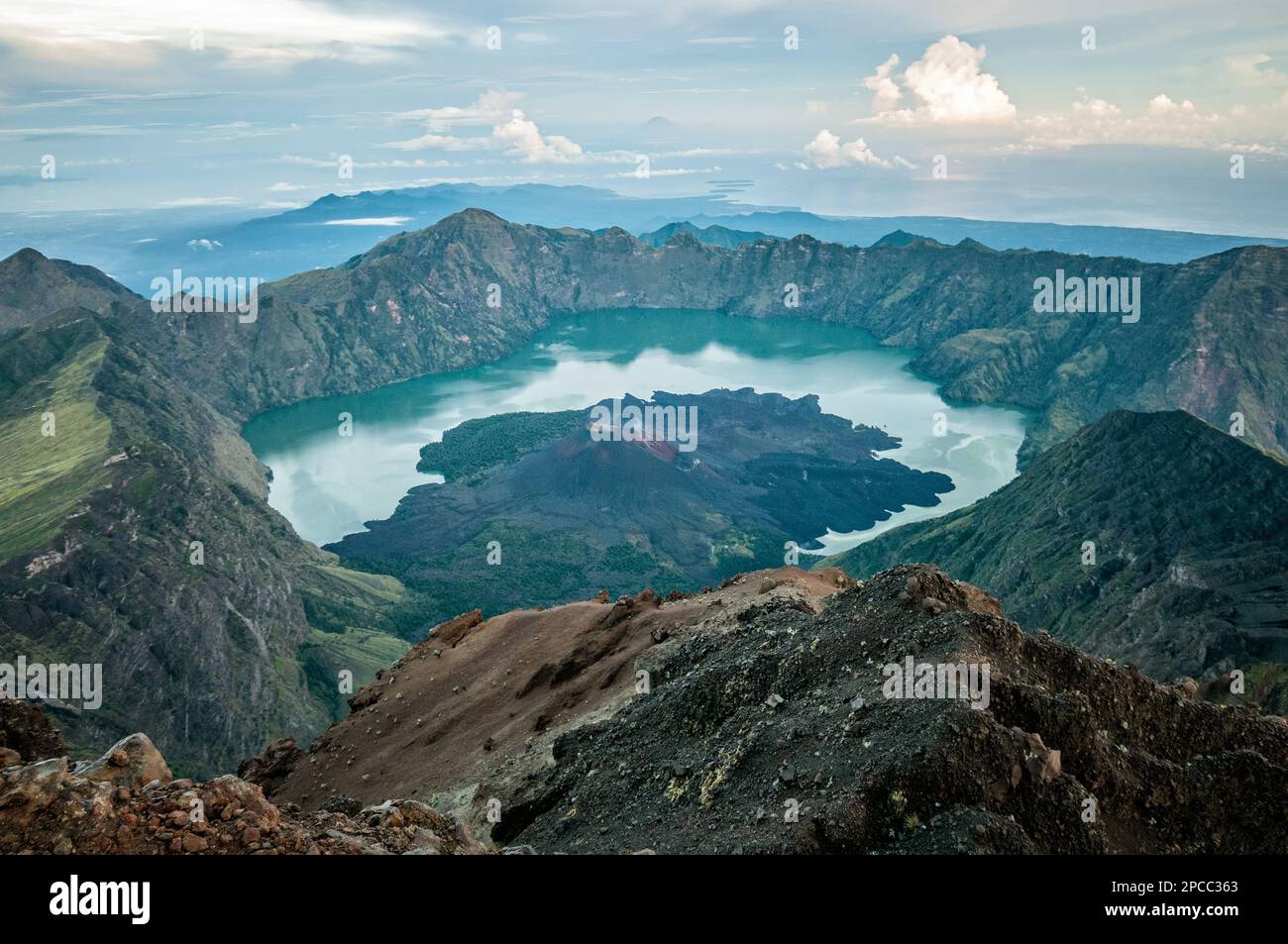 The beautiful caldera of Mount Rinjani from the summit in the early ...