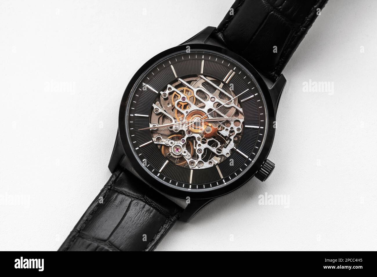 Black skeleton wrist watch with open movement, close-up photo Stock ...