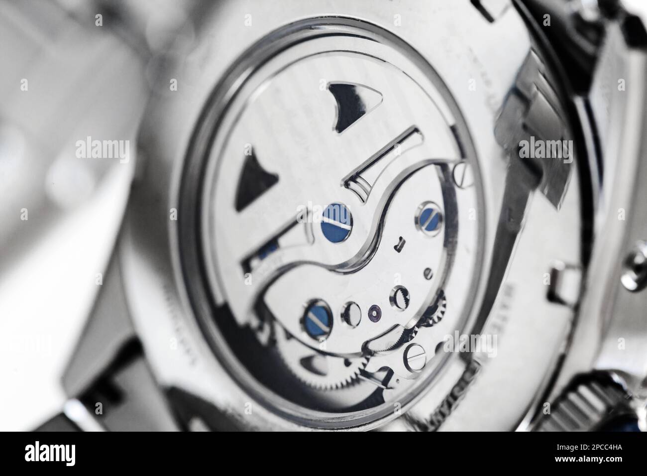 Movement of automatic mechanical wrist watch is behind transparent back ...