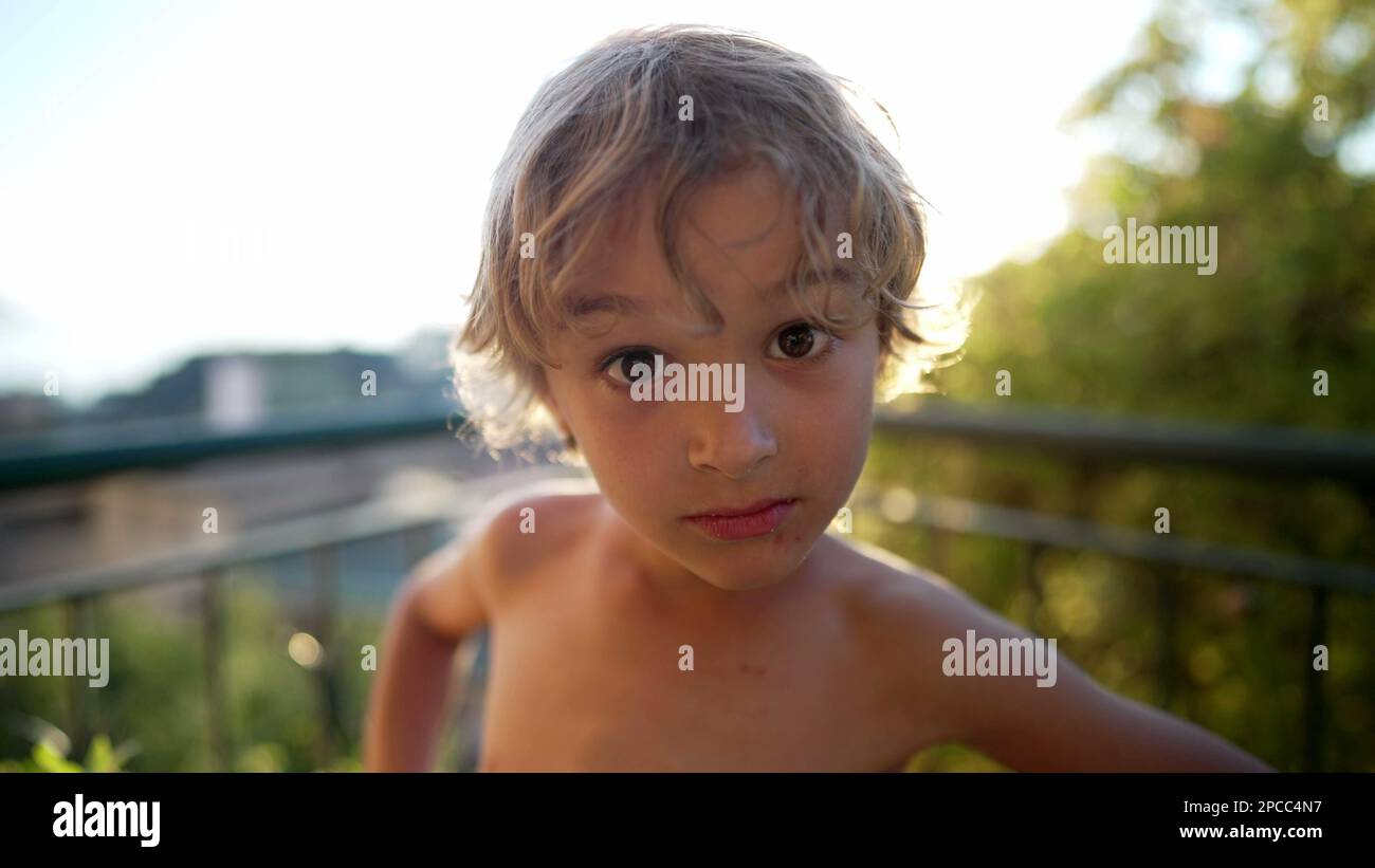 Young boy close up face with attitude and serious expression Stock ...