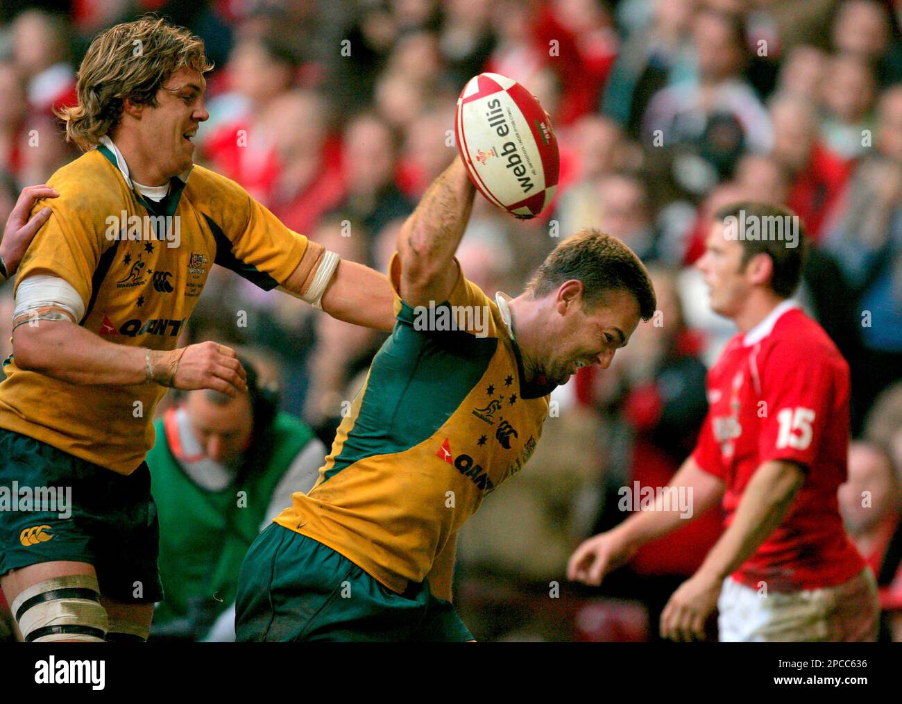 Australia's Stephen Hoiles, left, congratulates his teammate Chris ...
