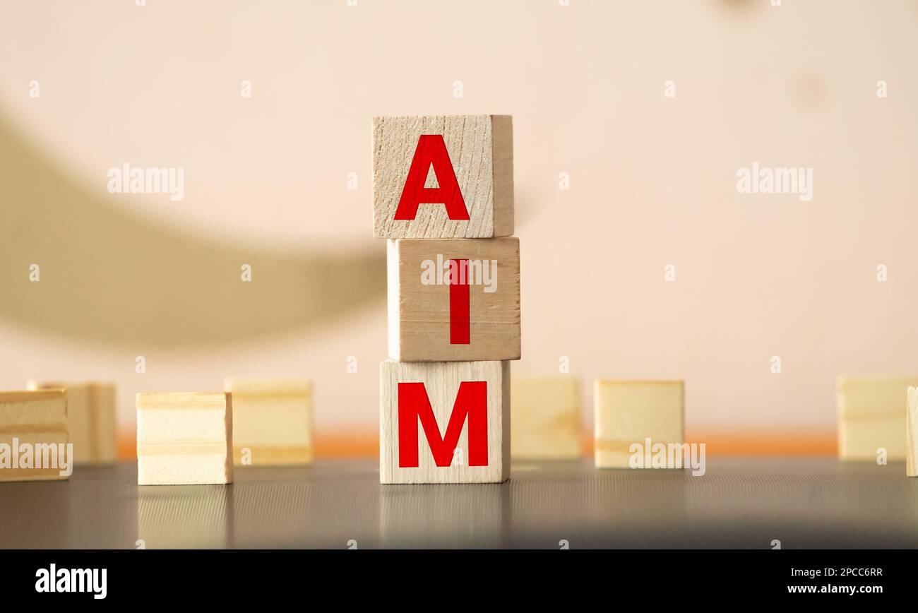 AIM word wooden object isolated white background and copy space - Goal ...