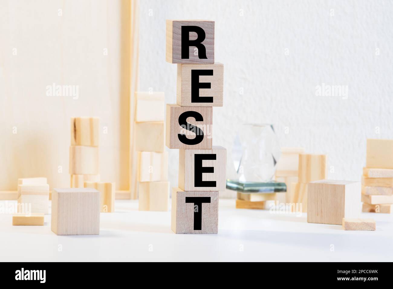 White tile alphabet letter with word reset on wood background Stock ...