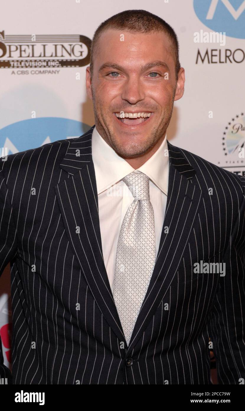 Actor Brian Austin Green, left, and Megan Fox arrive for the Beverly ...