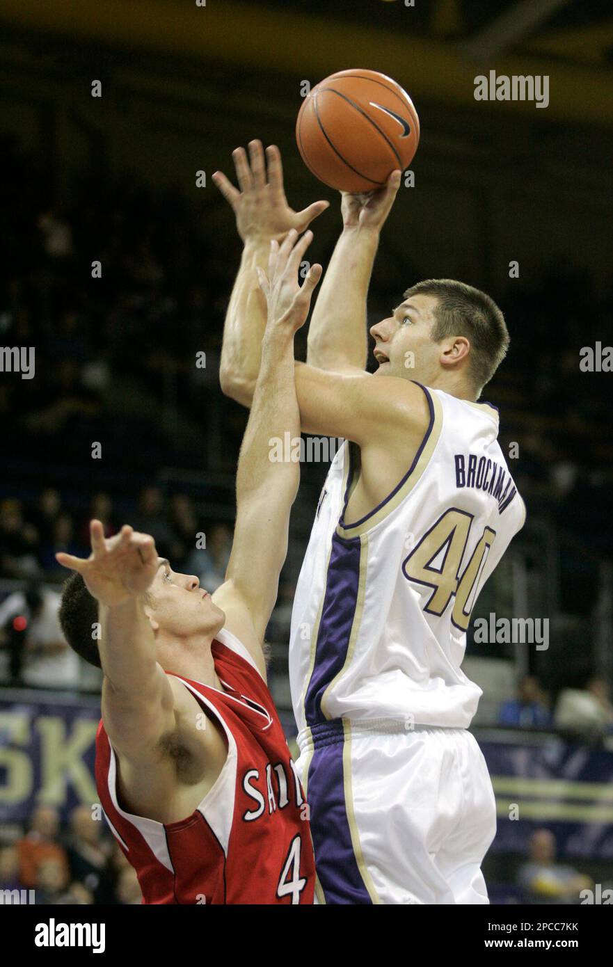 Washington forward Jon Brockman (40) puts up a shot over Saint Martin's ...