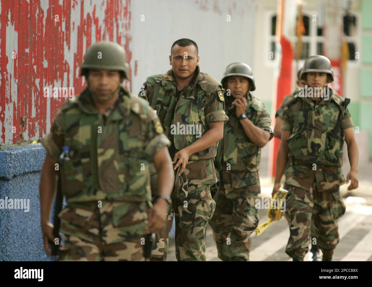 Nicaraguan army soldiers patrol the perimeter of the national stadium ...