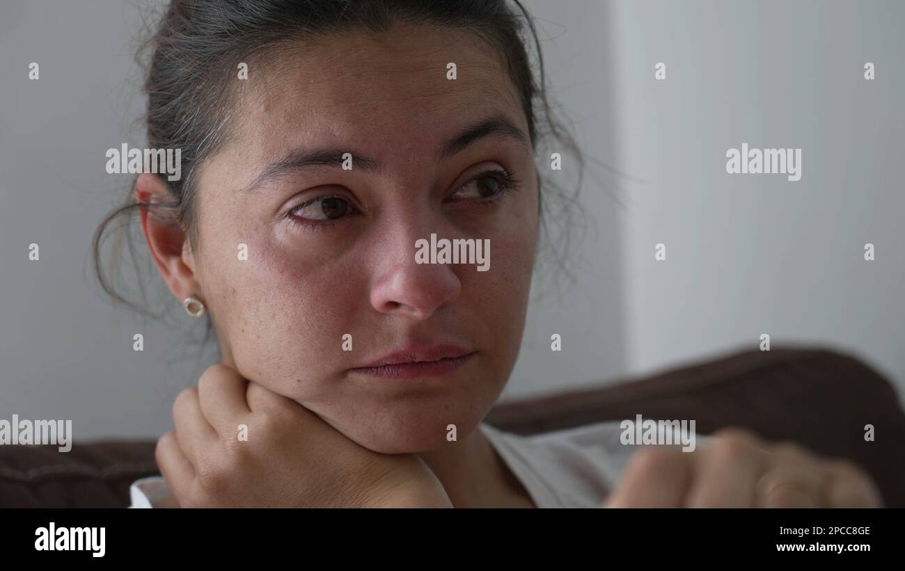 Portrait of a lonely woman suffering from mental problems during hard ...