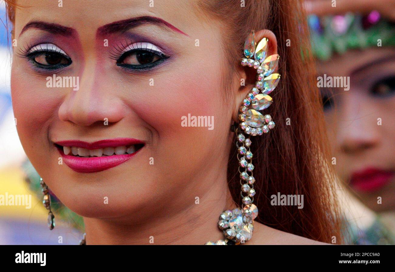 Contestants in a beauty pageant at the festival. (AP Photo/David ...