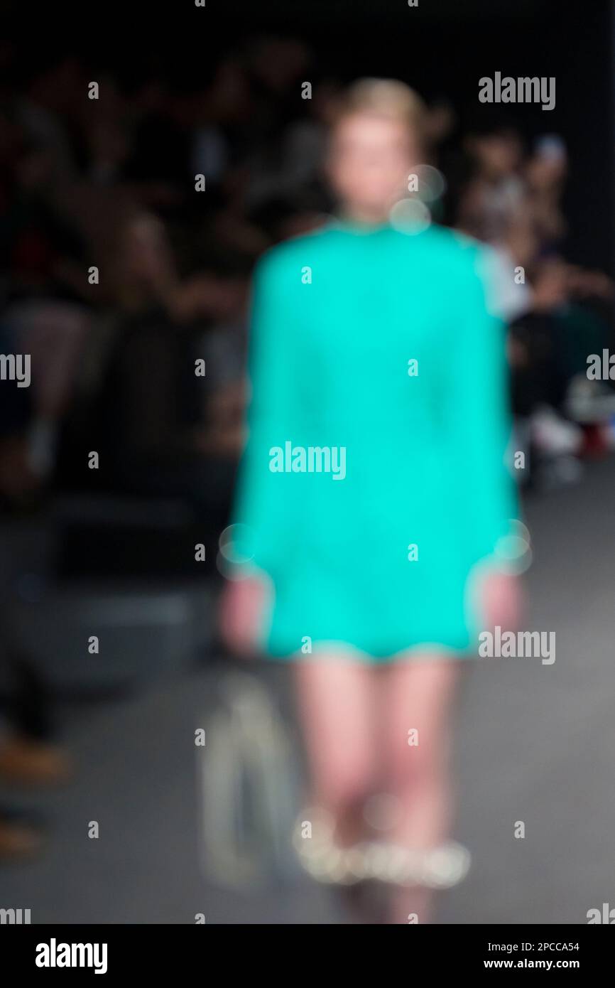 Half blurred view of a model walking down the catwalk during the Maria ...