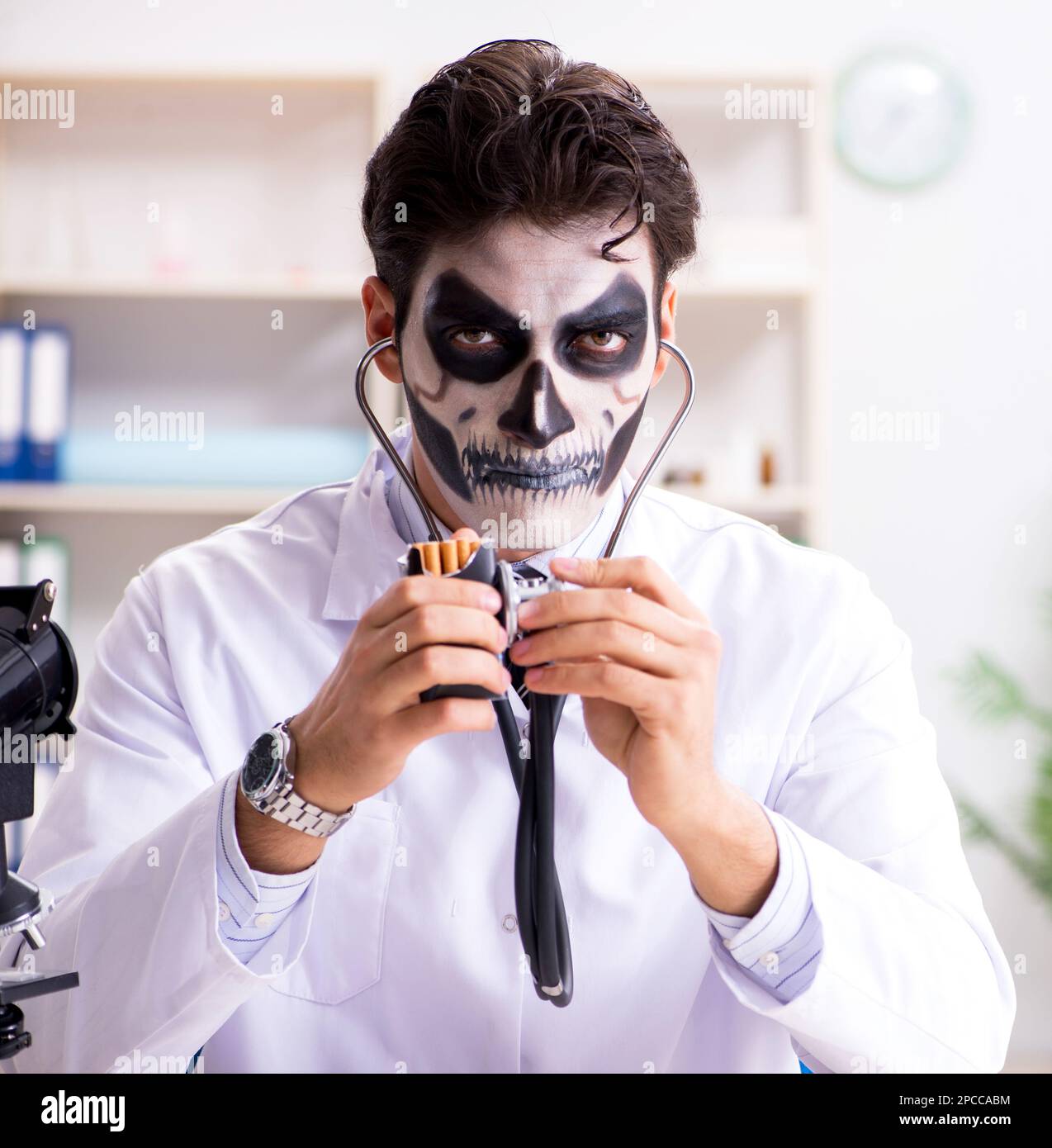 The scary monster doctor working in lab Stock Photo - Alamy