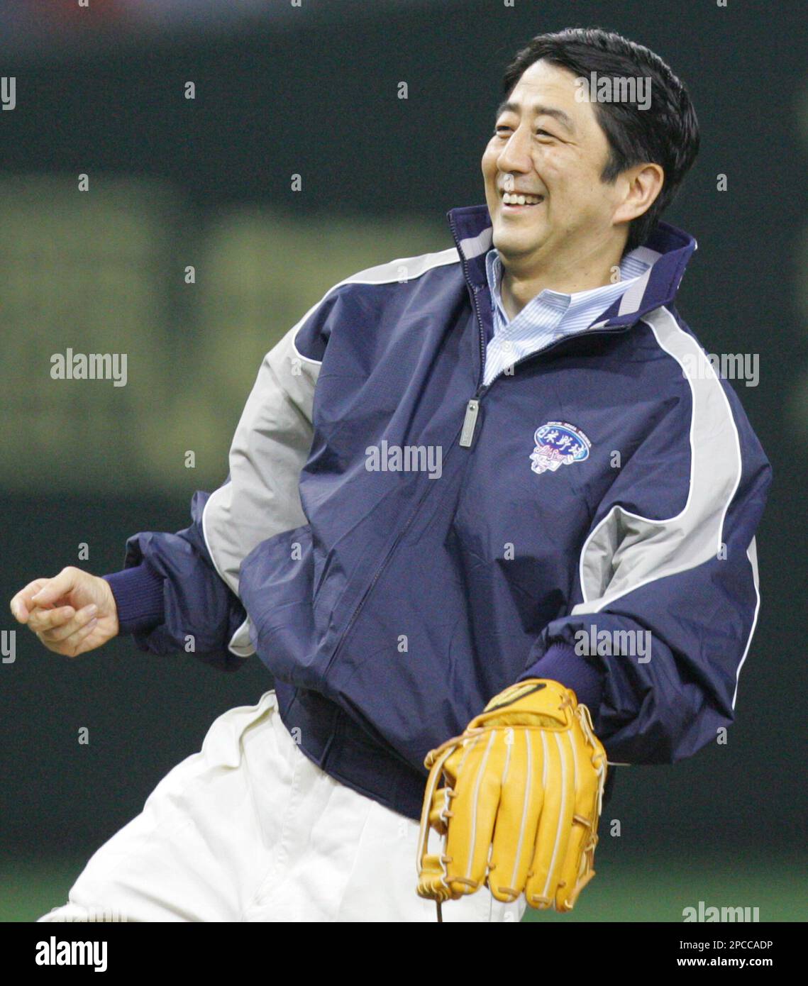 Japanese prime minister Shinzo Abe throw outs the ceremonial first ...