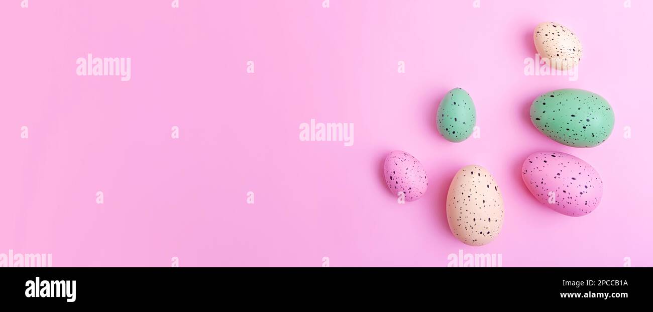 Frame from multicolored eggs on pink background,Easter concept.Large ...