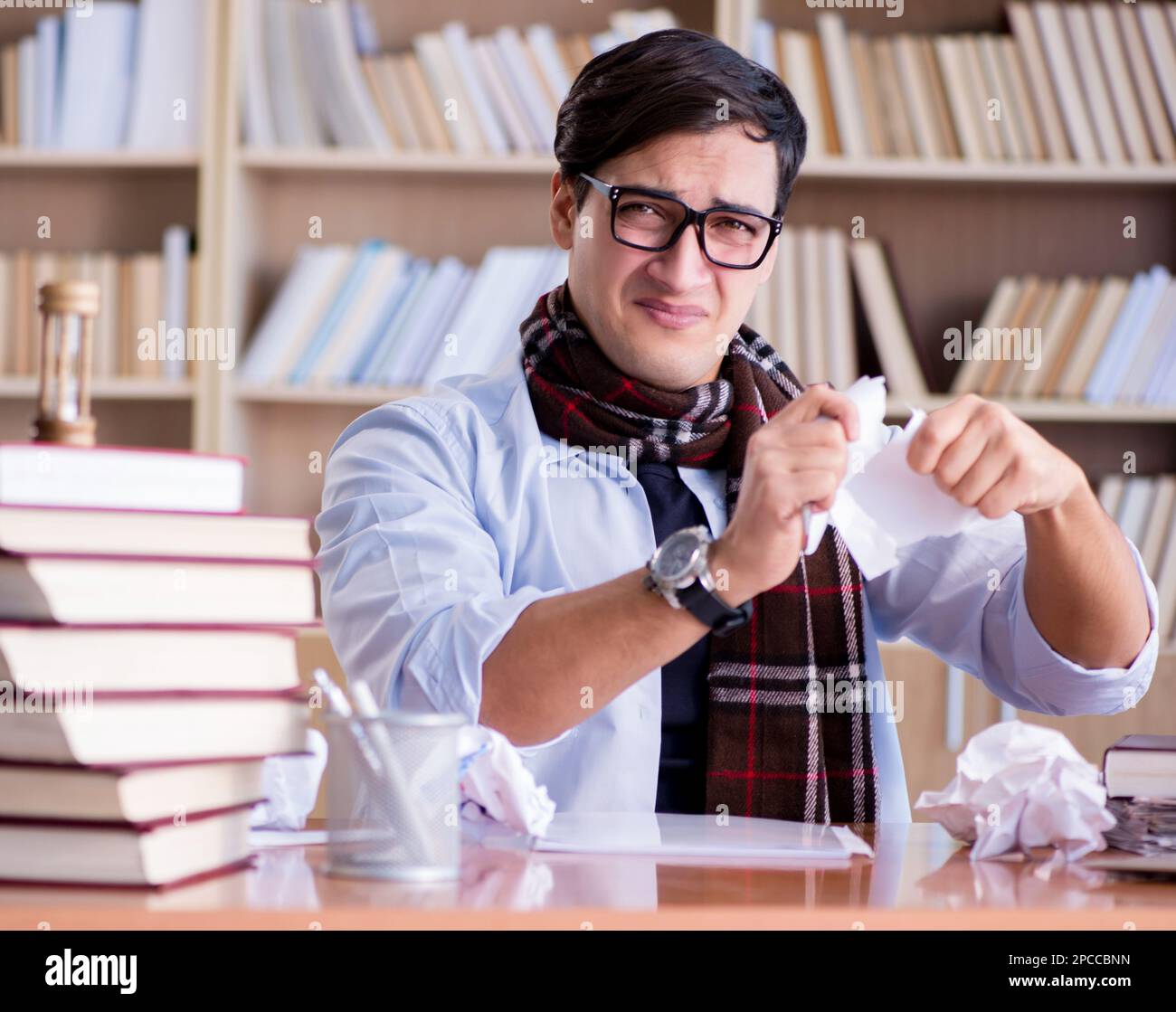 The young writer working in the library Stock Photo - Alamy
