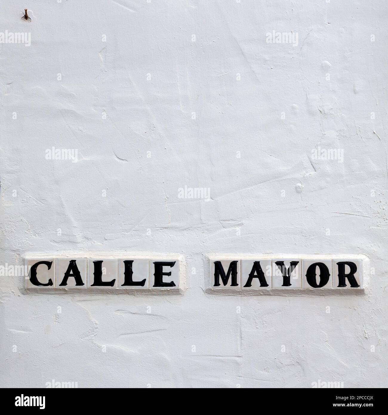 Calle Mayor street sign against a whitewashed wall. Lanzarote, Canary ...