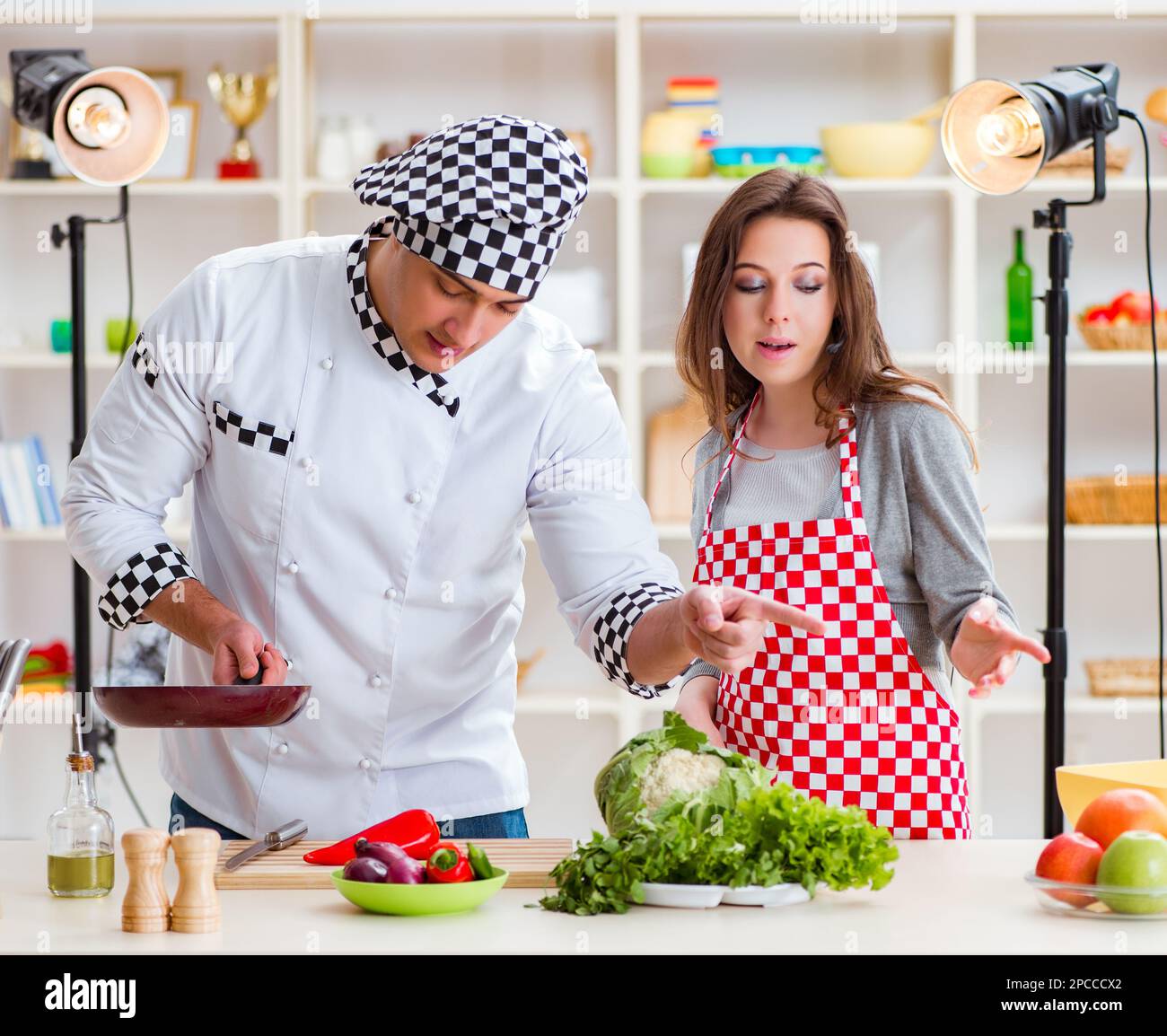 Professional cook filming cooking show hi-res stock photography and ...