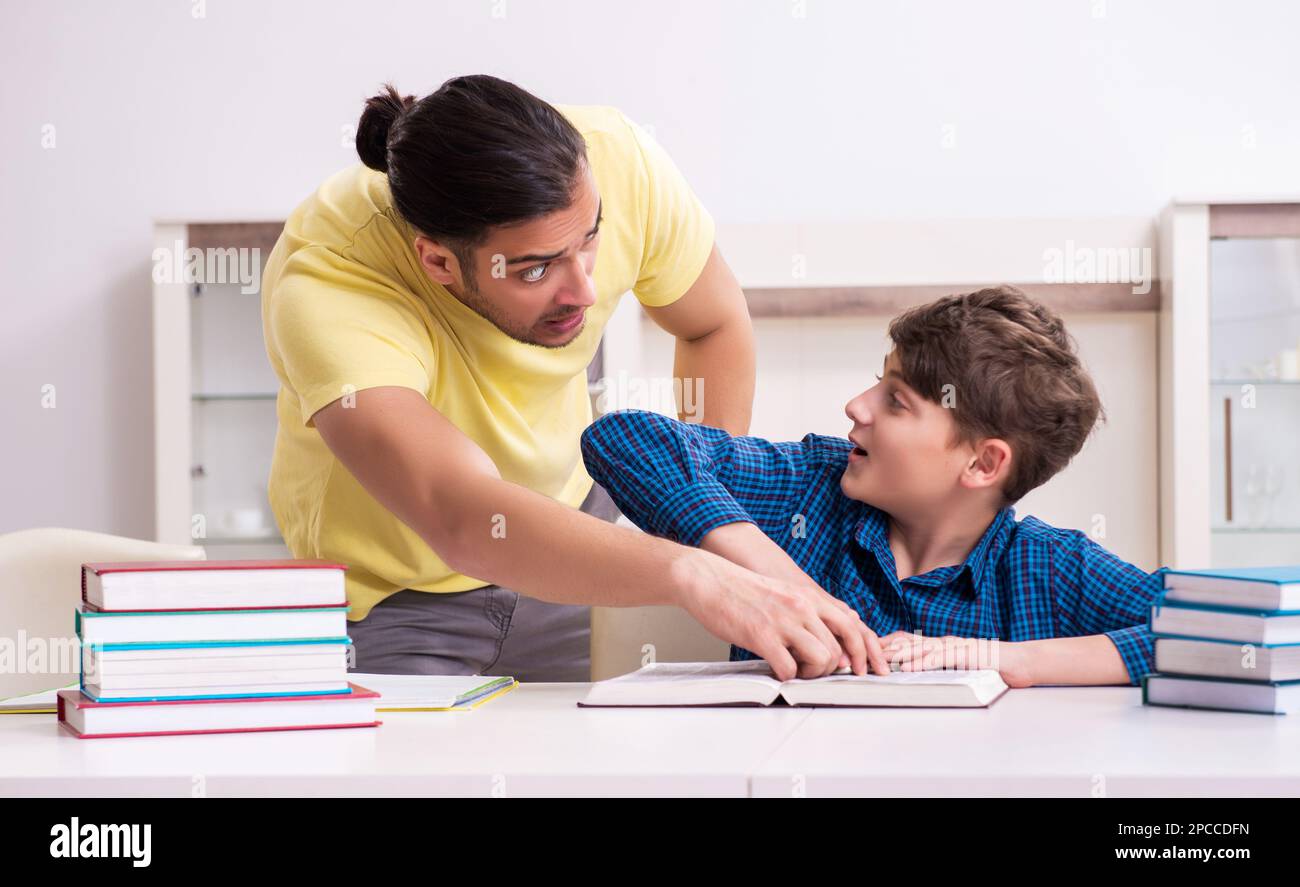 The father helping his son to prepare for school Stock Photo - Alamy