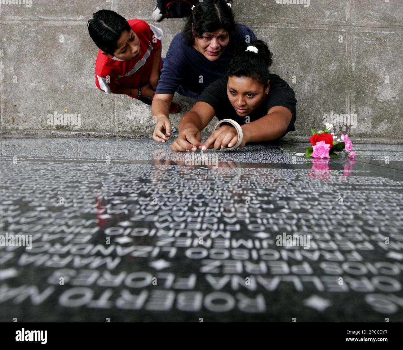 Kevin Chan Chan, 14, left, Maria Juana Medina Chan Chan, 54, center and Tania Patricia Chan Chan ...